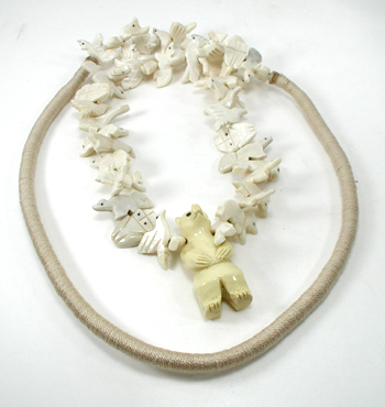 Stacked Animals necklace of bone with faux squaw wrap 30 inches long