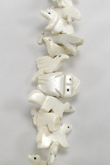 Stacked Animals necklace of bone with faux squaw wrap 30 inches long