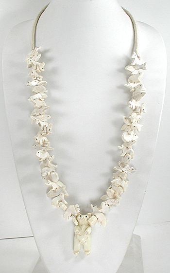 Stacked Animals necklace of bone with faux squaw wrap 32 inches long