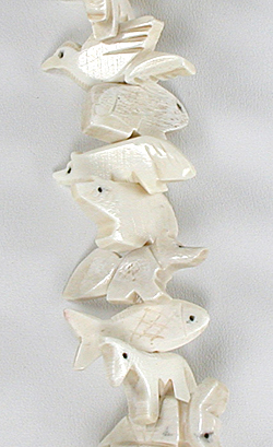 Stacked Animals necklace of bone with faux squaw wrap 32 inches long