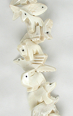 Stacked Animals necklace of bone with faux squaw wrap 32 inches long